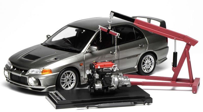 Schaalmodel Mitsubishi - Lancer Evo Iv With Engine And Accessories 1999